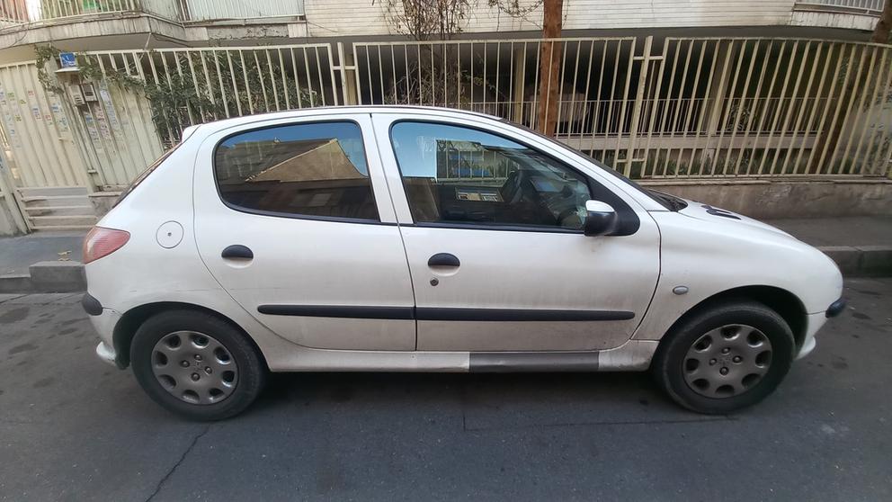 خرید و فروش پژو 206 تیپ 5 مدل 1393 با ضمانت – همراه مکانیک