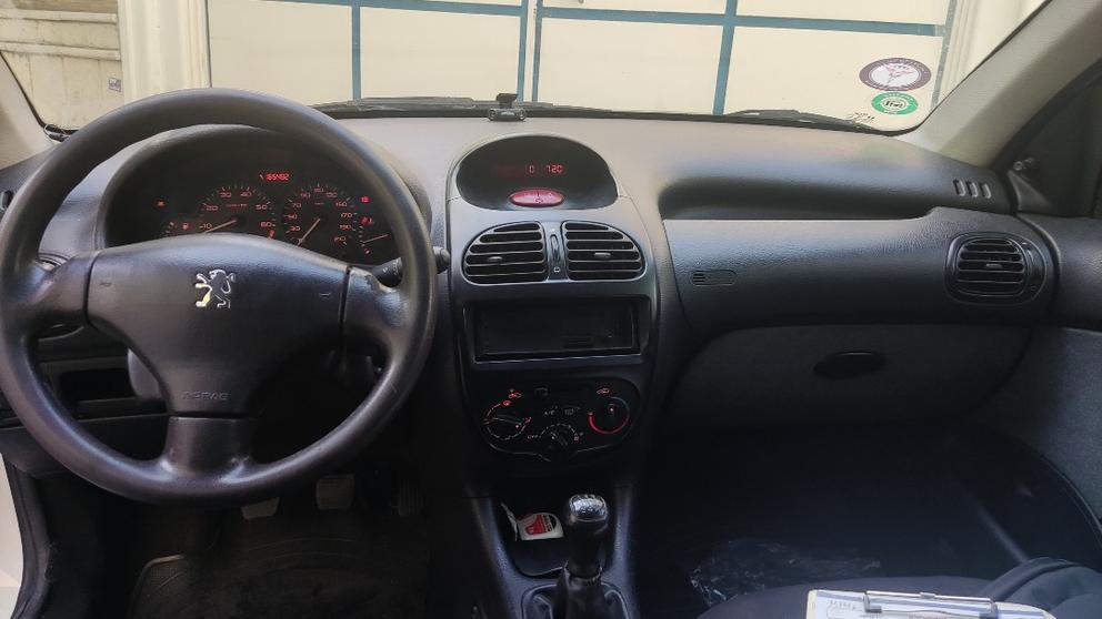 خرید و فروش پژو 206 تیپ 2 مدل 1391 با ضمانت – همراه مکانیک