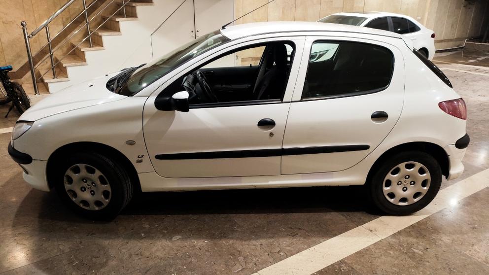 خرید و فروش پژو 206 تیپ 5 مدل 1393 با ضمانت – همراه مکانیک